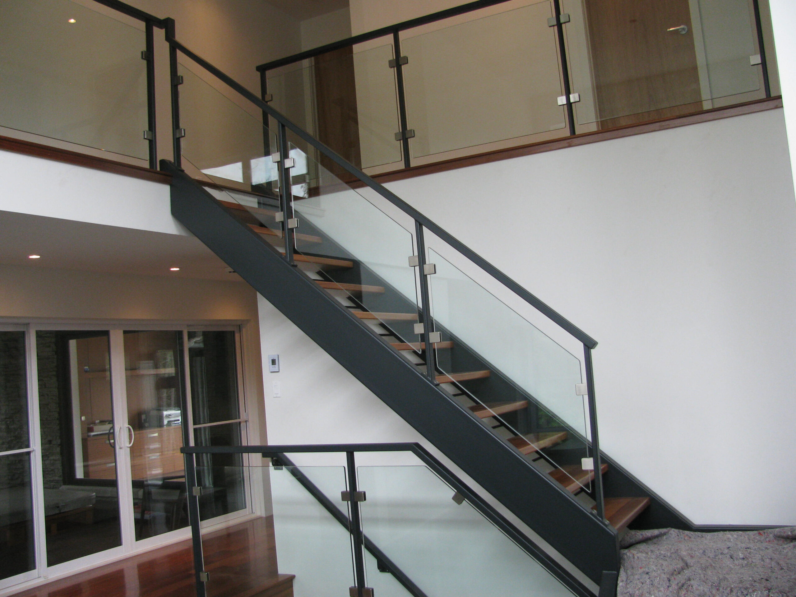 Painted Steel Stringers and Handrail With Glass Panels - McSheffery ...